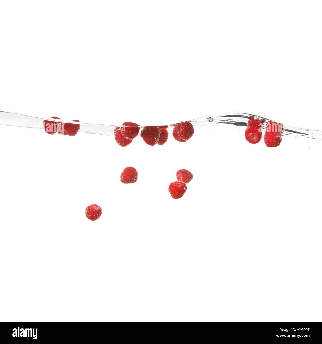 Raspberries floating in water Stock Photo - Alamy