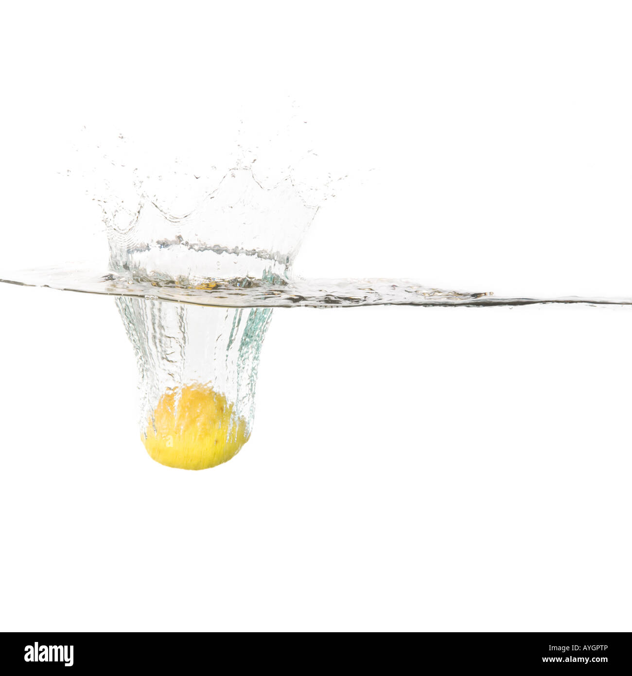 A lemon splashing in water Stock Photo - Alamy