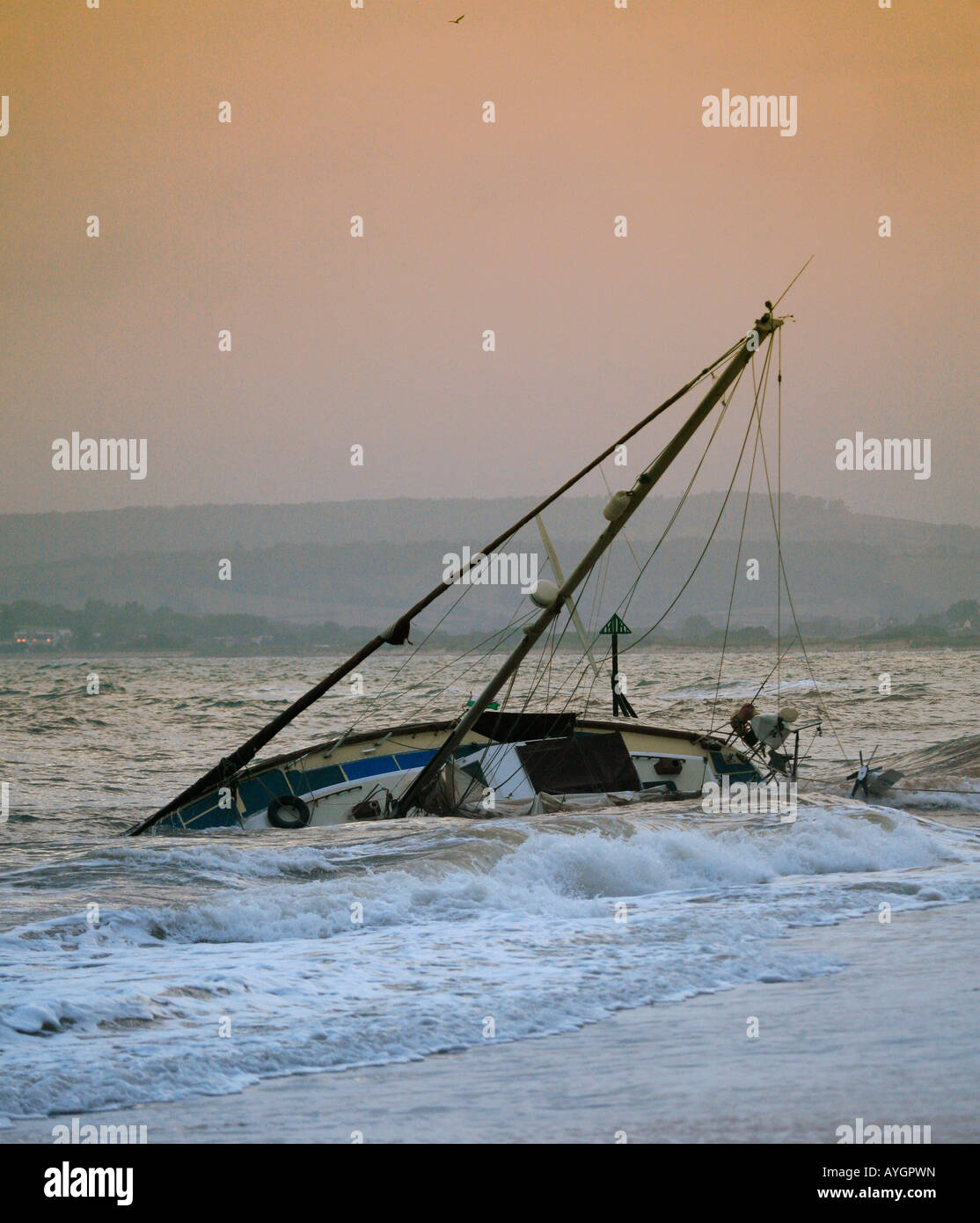 Yacht shipwrecked on the beach at Exmouth, Devon in Summer storm 2007 ...