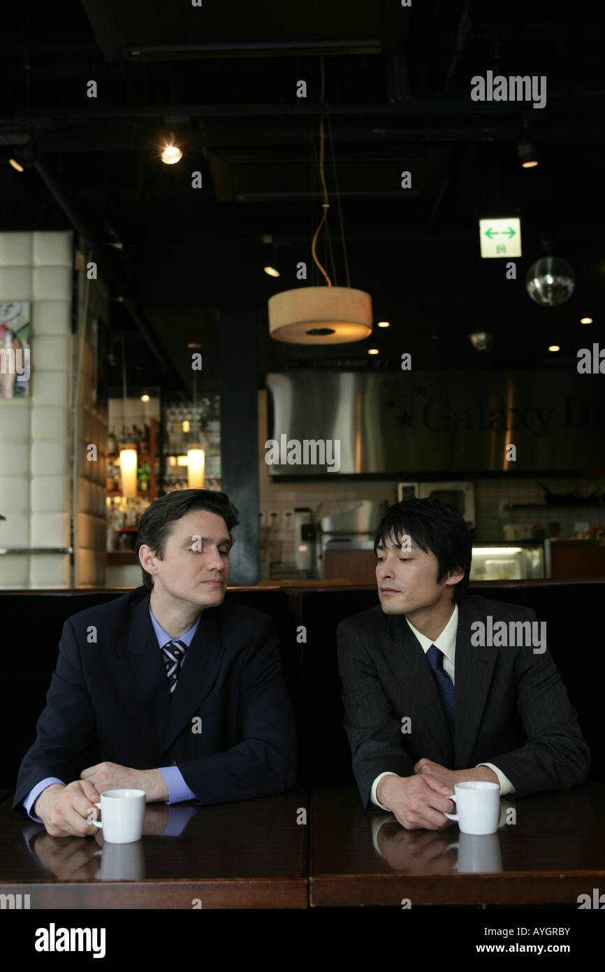Businessmen during coffee break Stock Photo - Alamy
