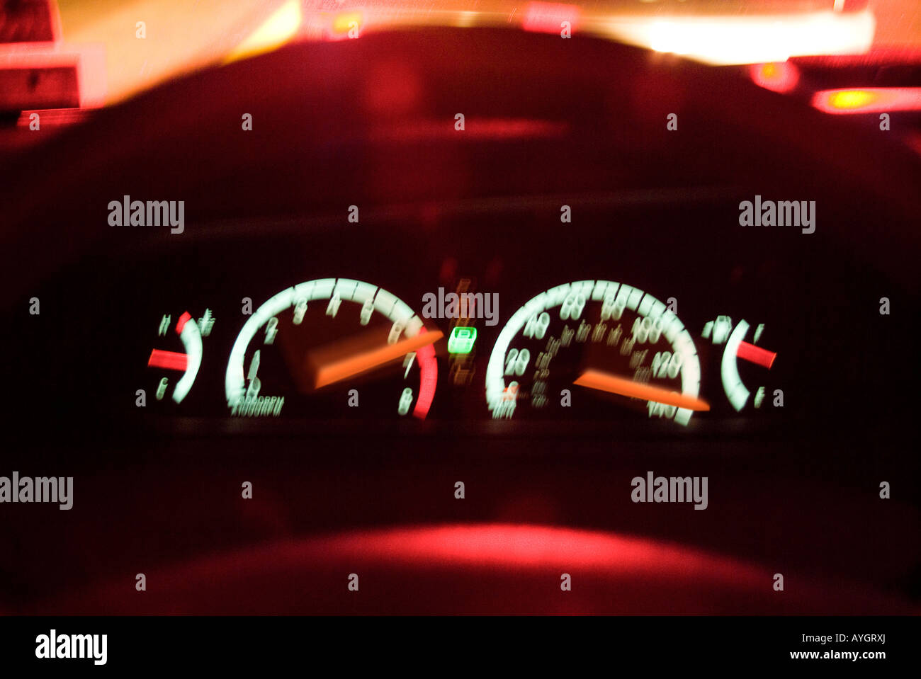 Instrument controls in speeding race car Stock Photo - Alamy
