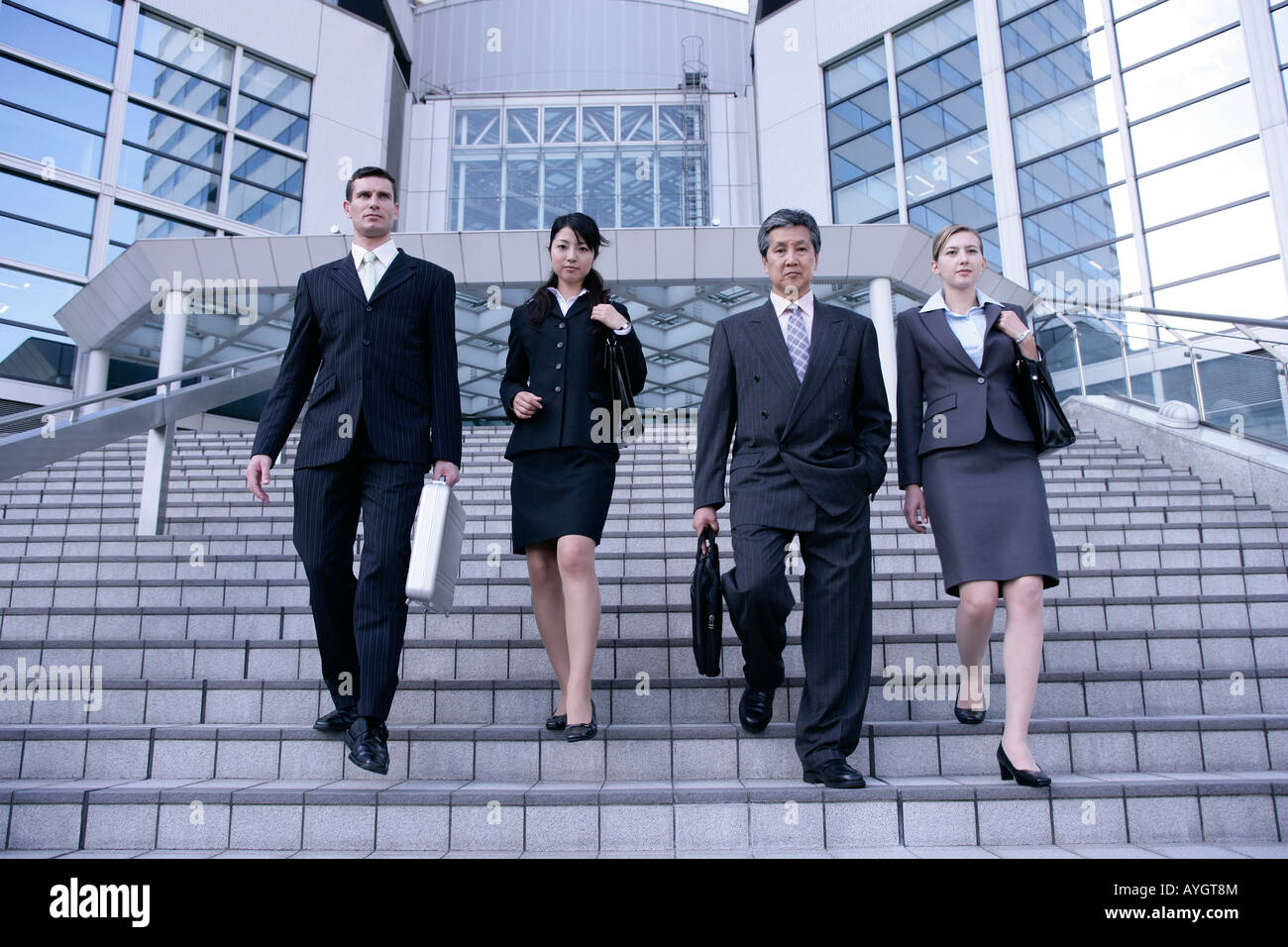 Group people walking down steps hi-res stock photography and images - Alamy