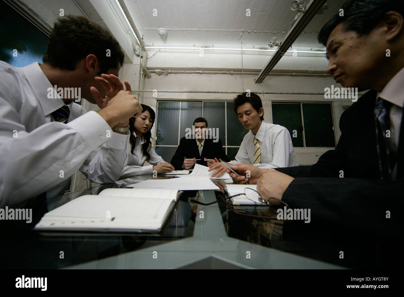 five people having business meeting in conference room Stock Photo - Alamy