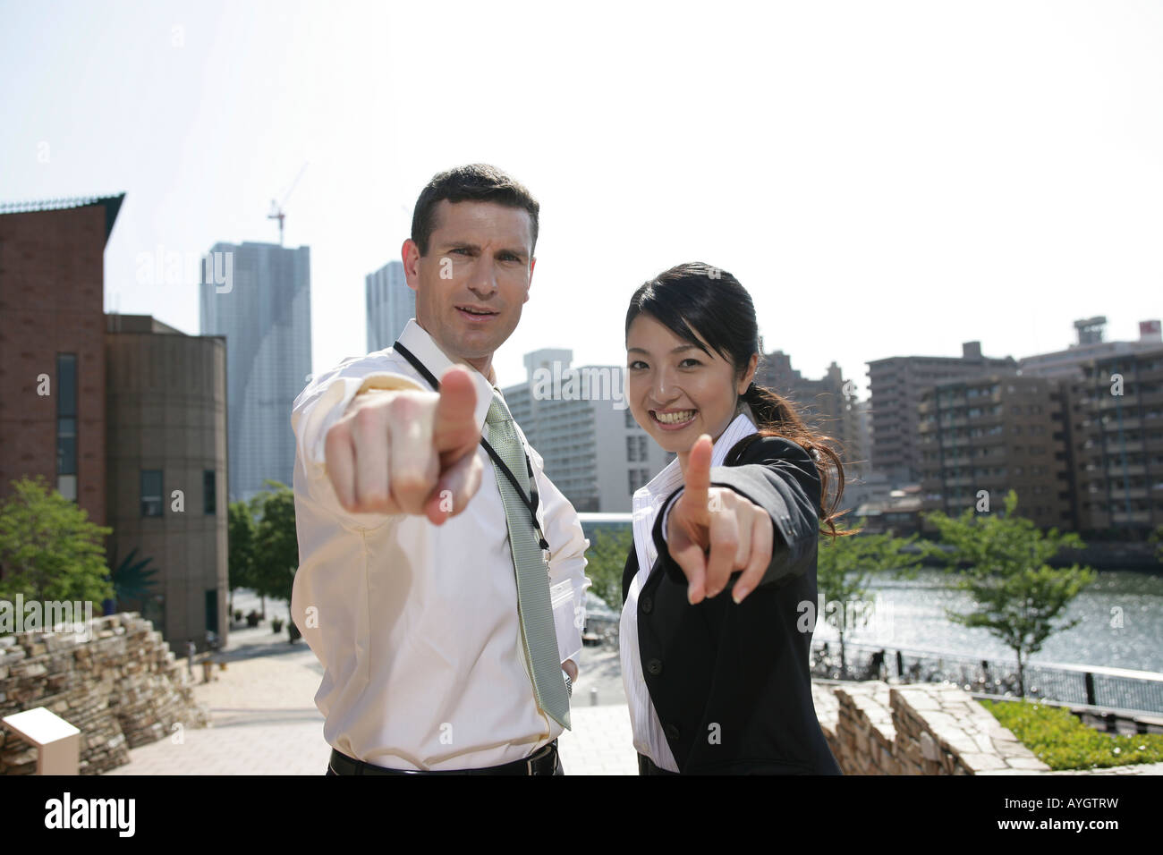 Business people pointing fingers at camera Stock Photo - Alamy