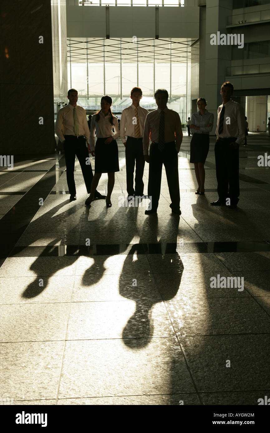 Group portrait of businesspeople in lobby Stock Photo - Alamy