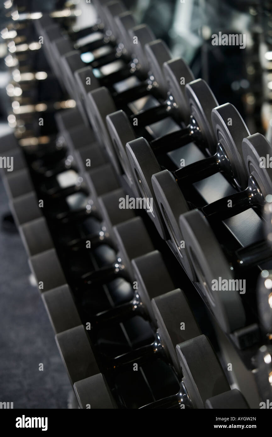 Close up of rows of free weights Stock Photo - Alamy
