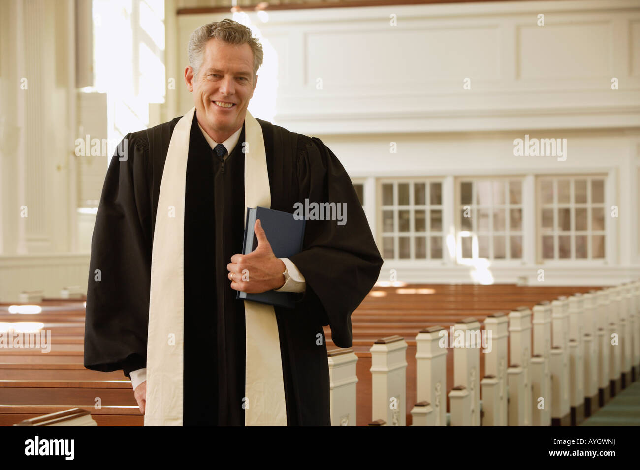 Priest standing religion holding spirituality hi-res stock photography ...