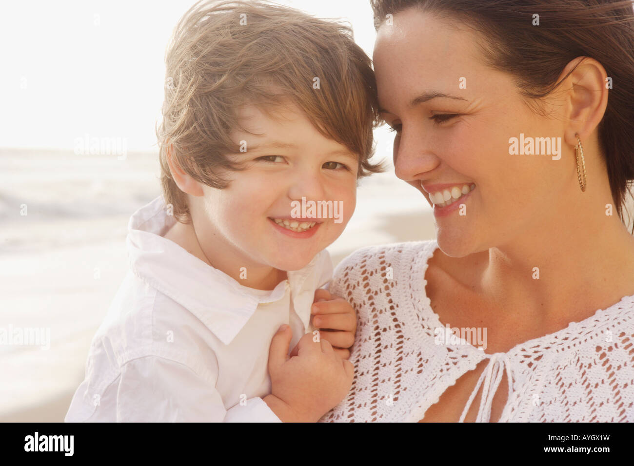 Close up of mother and son smiling Stock Photo - Alamy