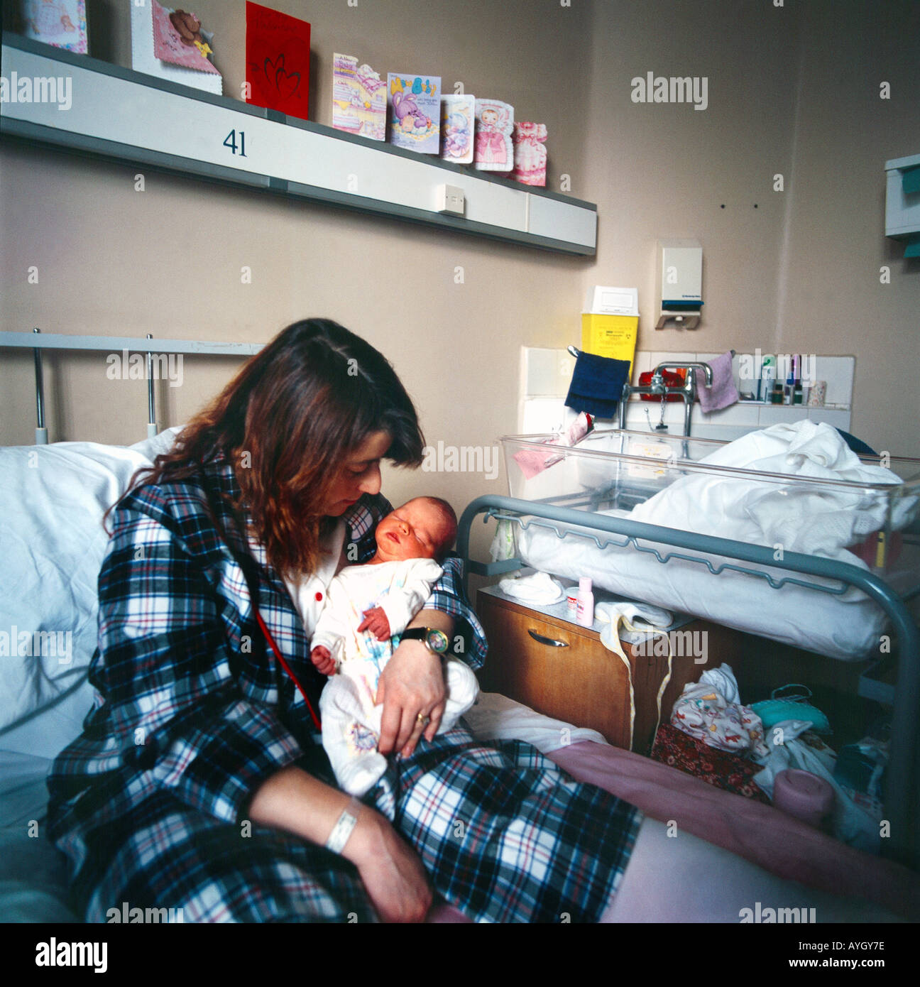 Mother & Newborn Baby In Hospital Mother Holding Baby Stock Photo - Alamy