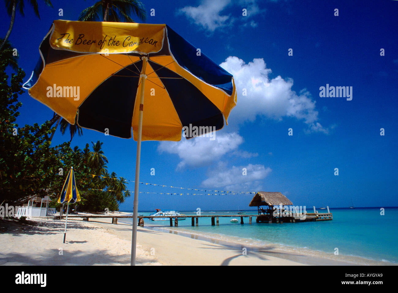 Pigeon Point Tobago Beach Umbrella Jetty And Beach Stock Photo - Alamy