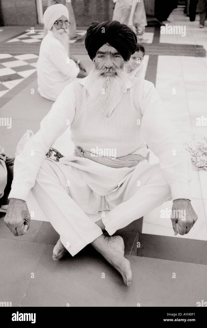Sikh people in a Gurdwara in New Delhi in India in South Asia. Sikhism ...