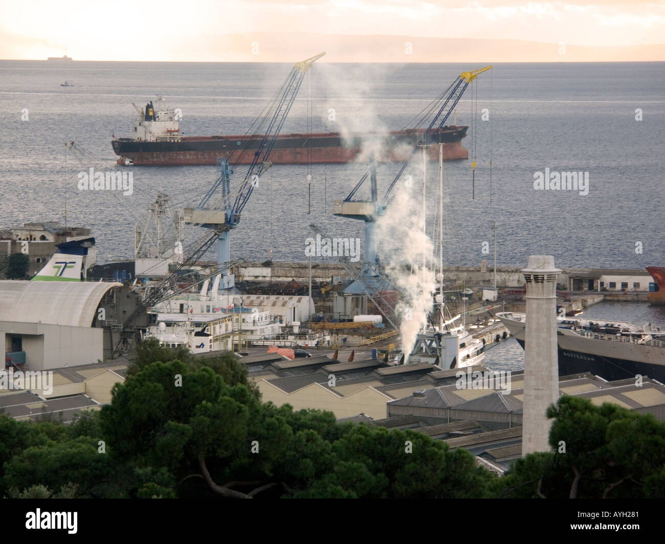 Dusk over the bay of gibraltar shipyard hi-res stock photography and ...