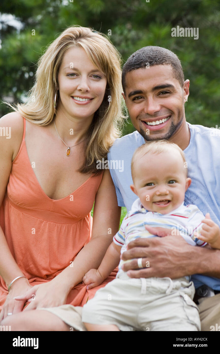 Multi-ethnic family with baby Stock Photo - Alamy