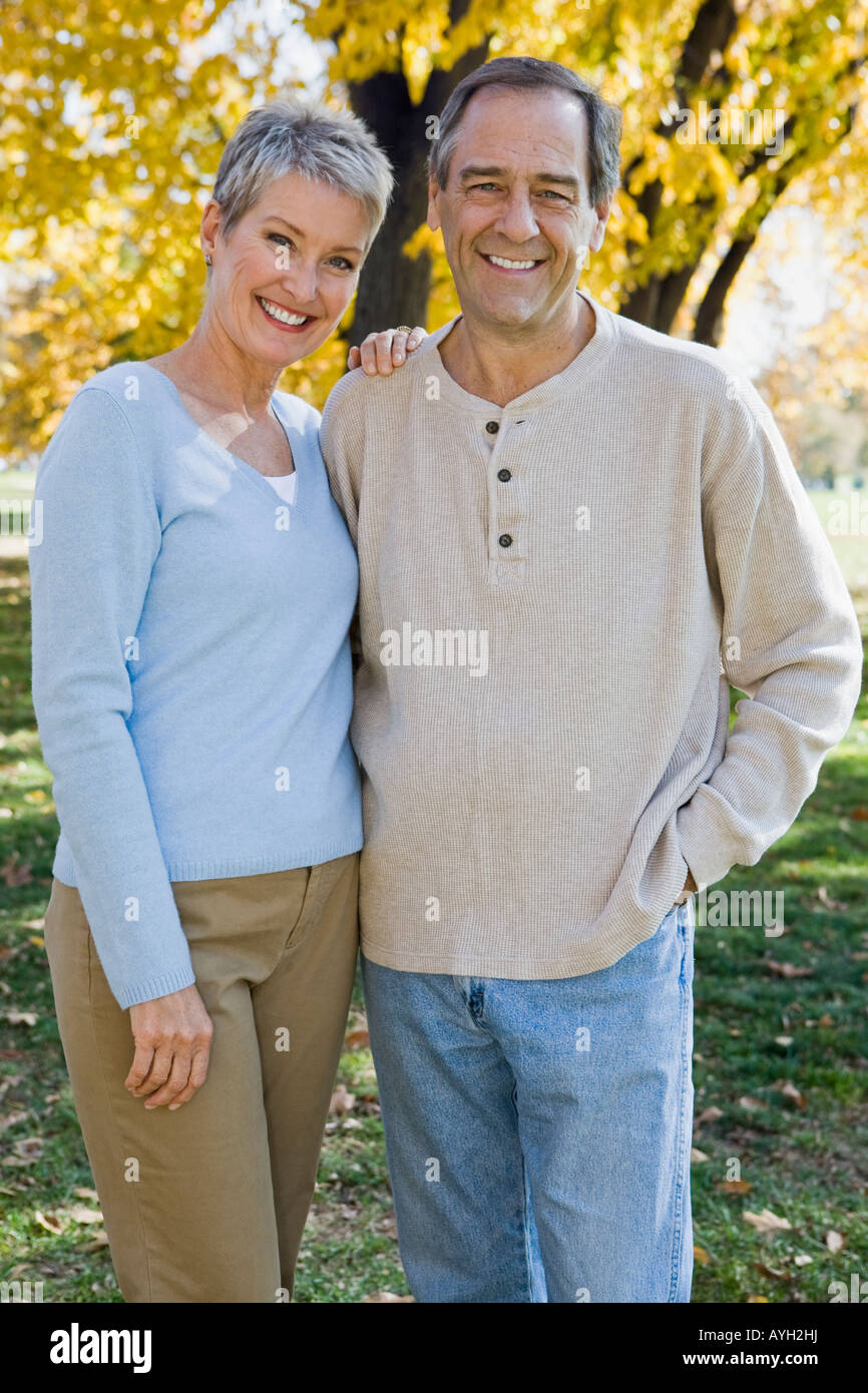 Mature couple hugging outdoors Stock Photo - Alamy
