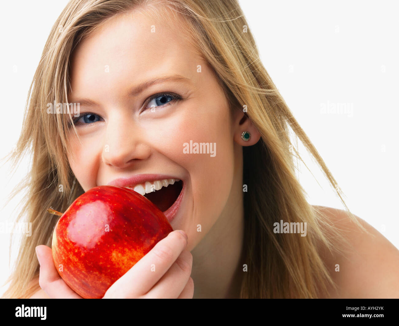 Woman eating apple Stock Photo - Alamy