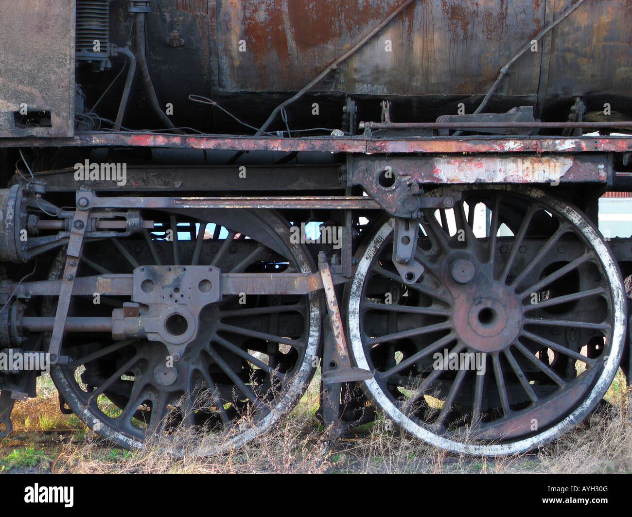 Abandoned old steam engine wheels Stock Photo - Alamy