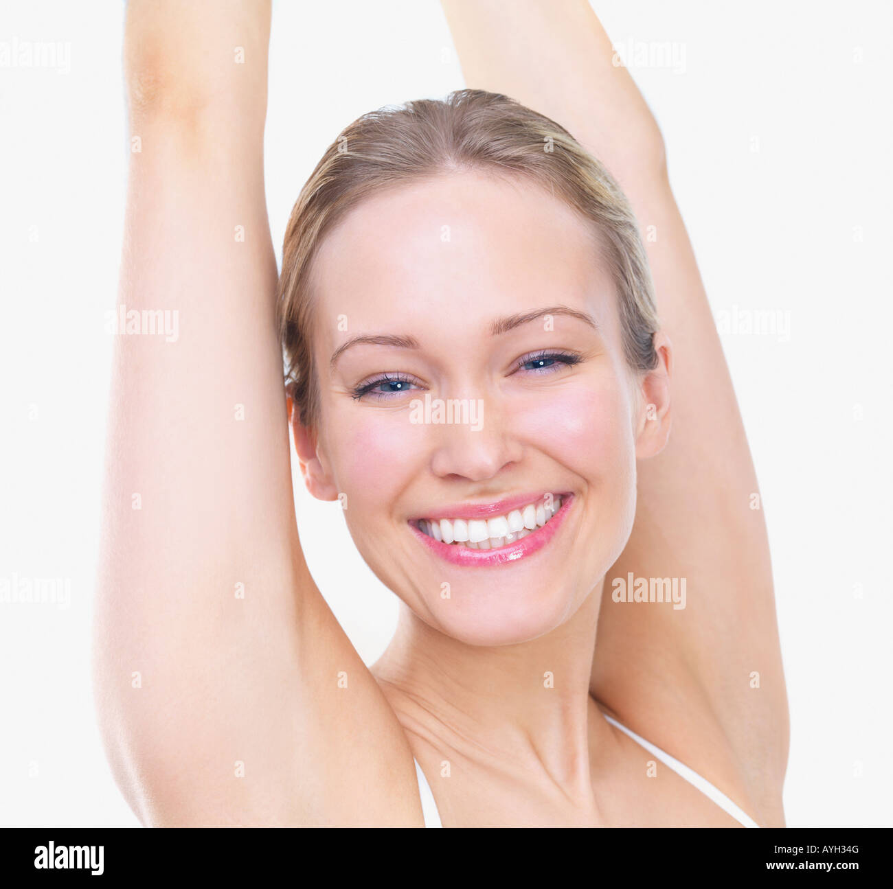 Woman stretching arms over head Stock Photo - Alamy