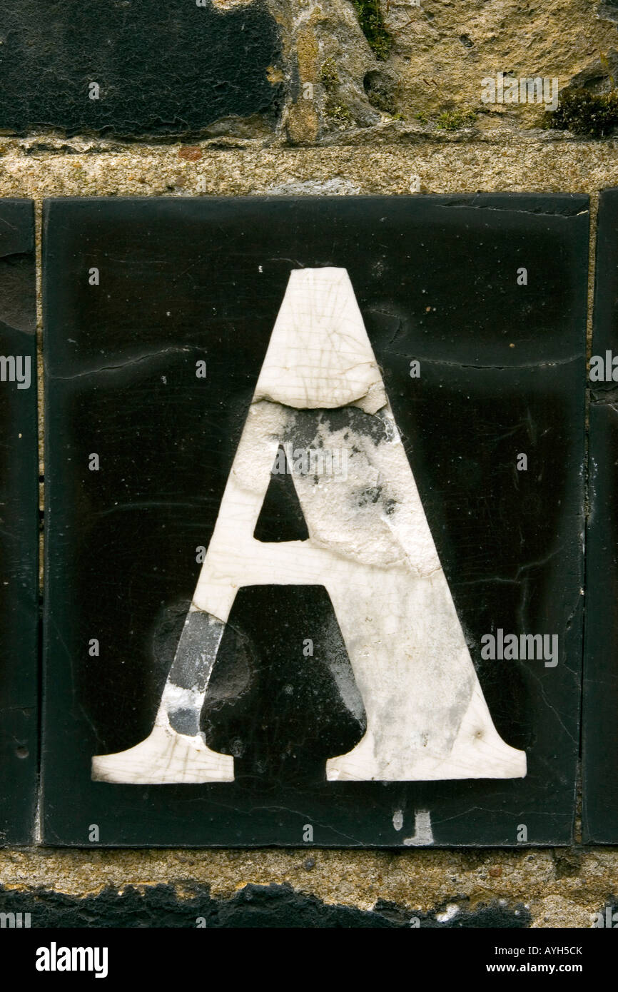 A broken and damaged letter A from street sign London England UK Stock ...