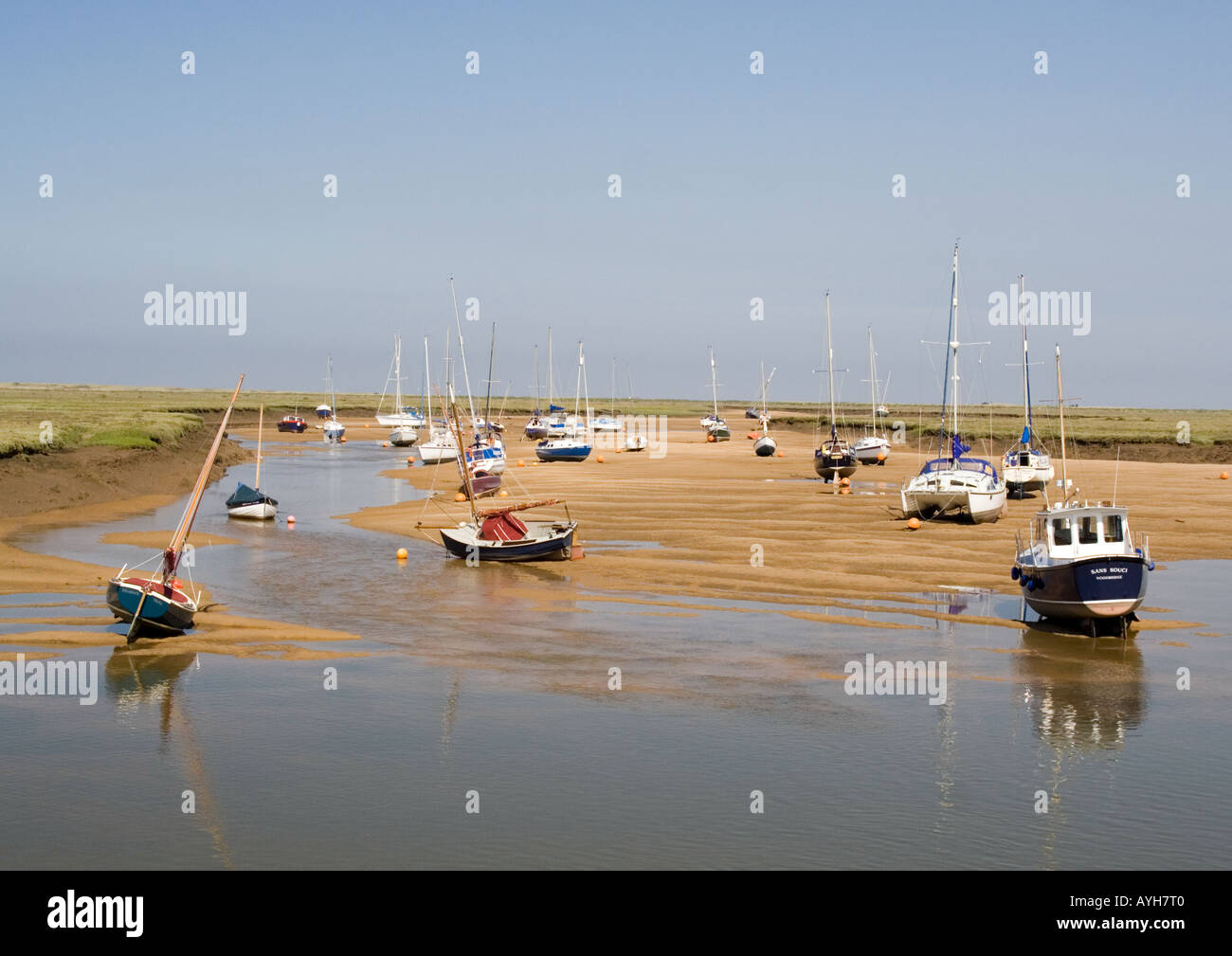 sailing boats on sand bank of river estuary Stock Photo - Alamy