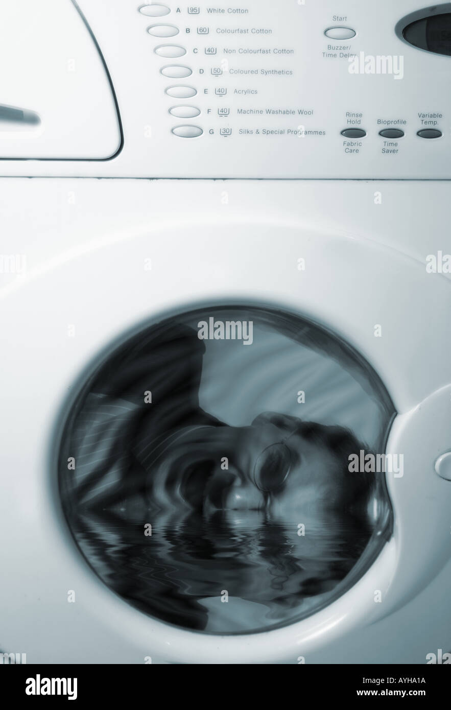 Business man trapped in a washing machine Stock Photo - Alamy