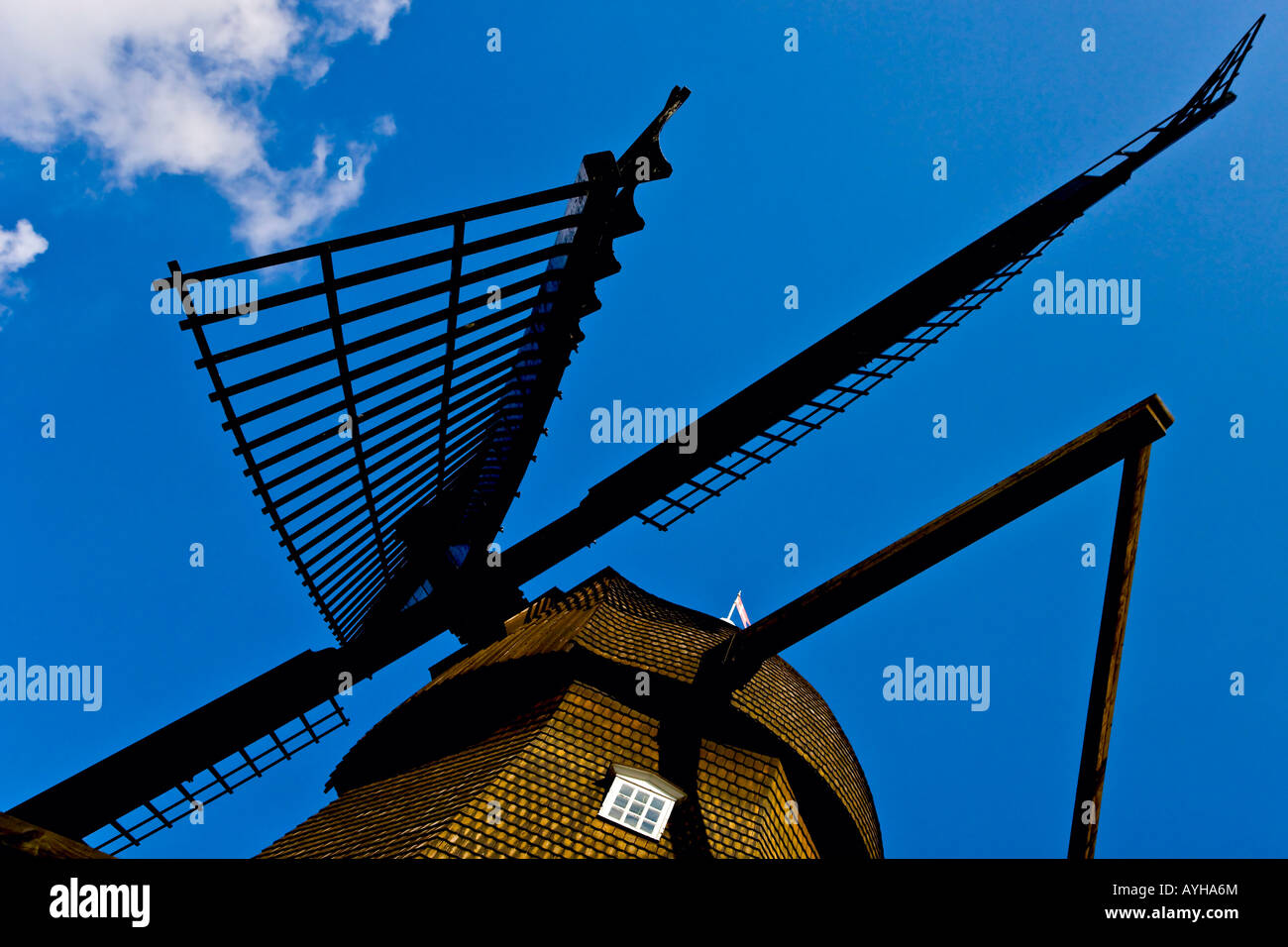 Old windmill from a sideview Stock Photo - Alamy
