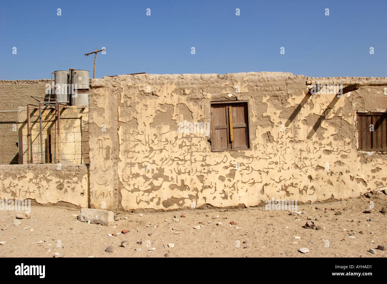 carved modern inscriptions in arabic on a house wall Stock Photo - Alamy