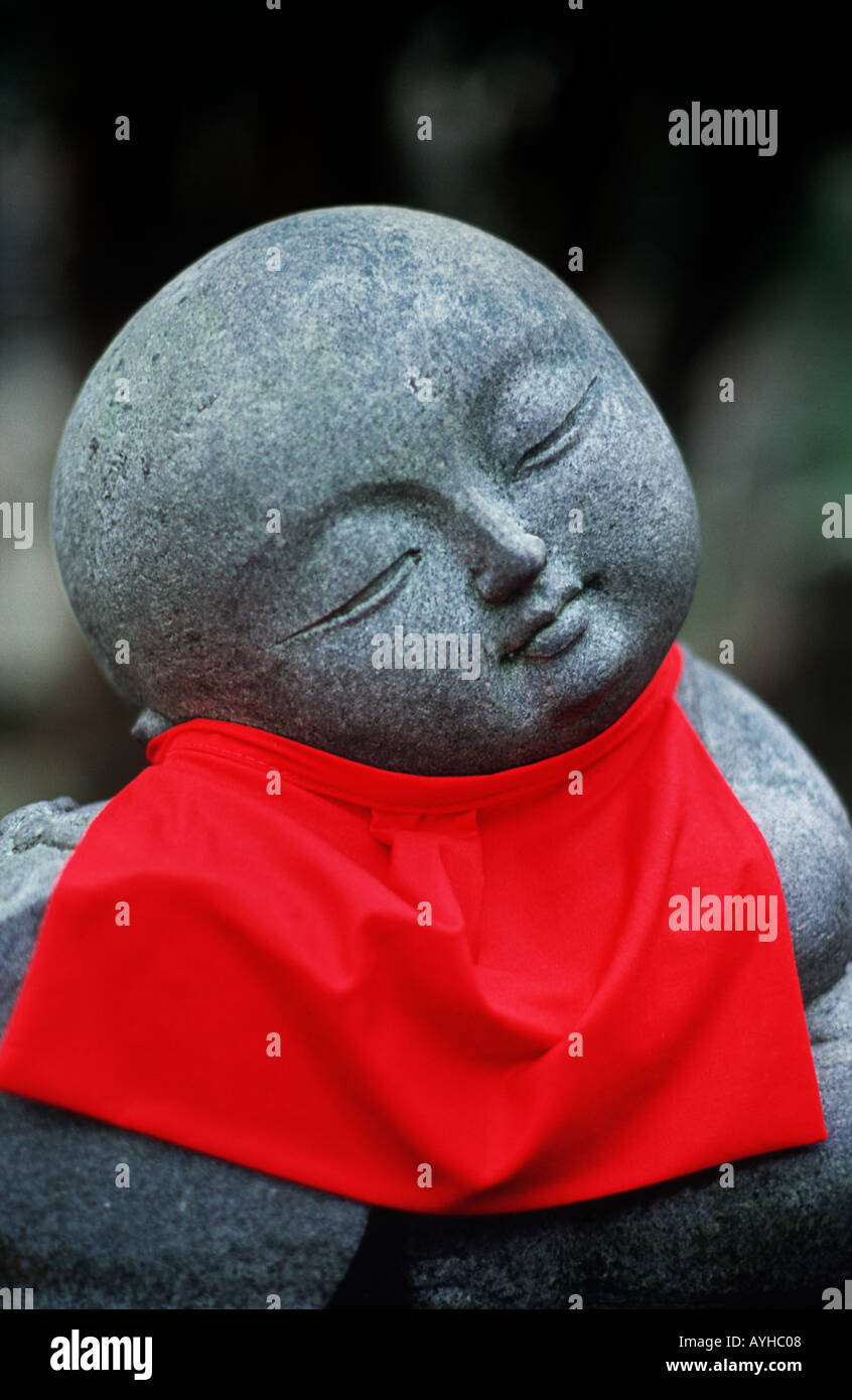 Mizo jizo sculpture with red fabric bib Yakoshido Shrine dedicated to ...