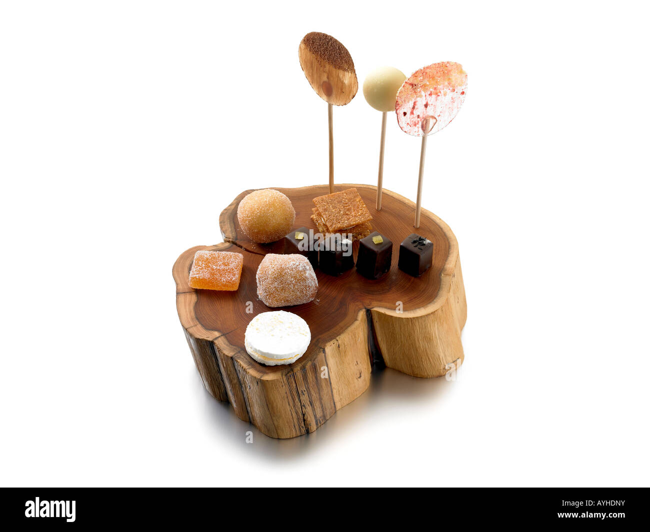Petit fours lollies chocolates wooden server art food Stock Photo - Alamy