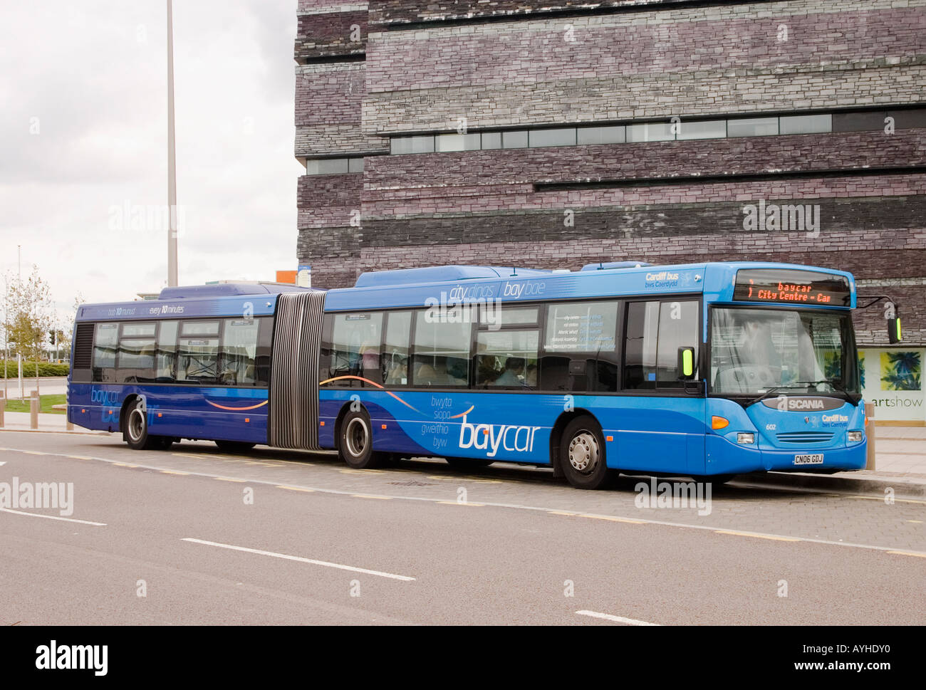 City Baycar bendibus waiting at stop on Millenium Plaza Cardiff Bay UK ...
