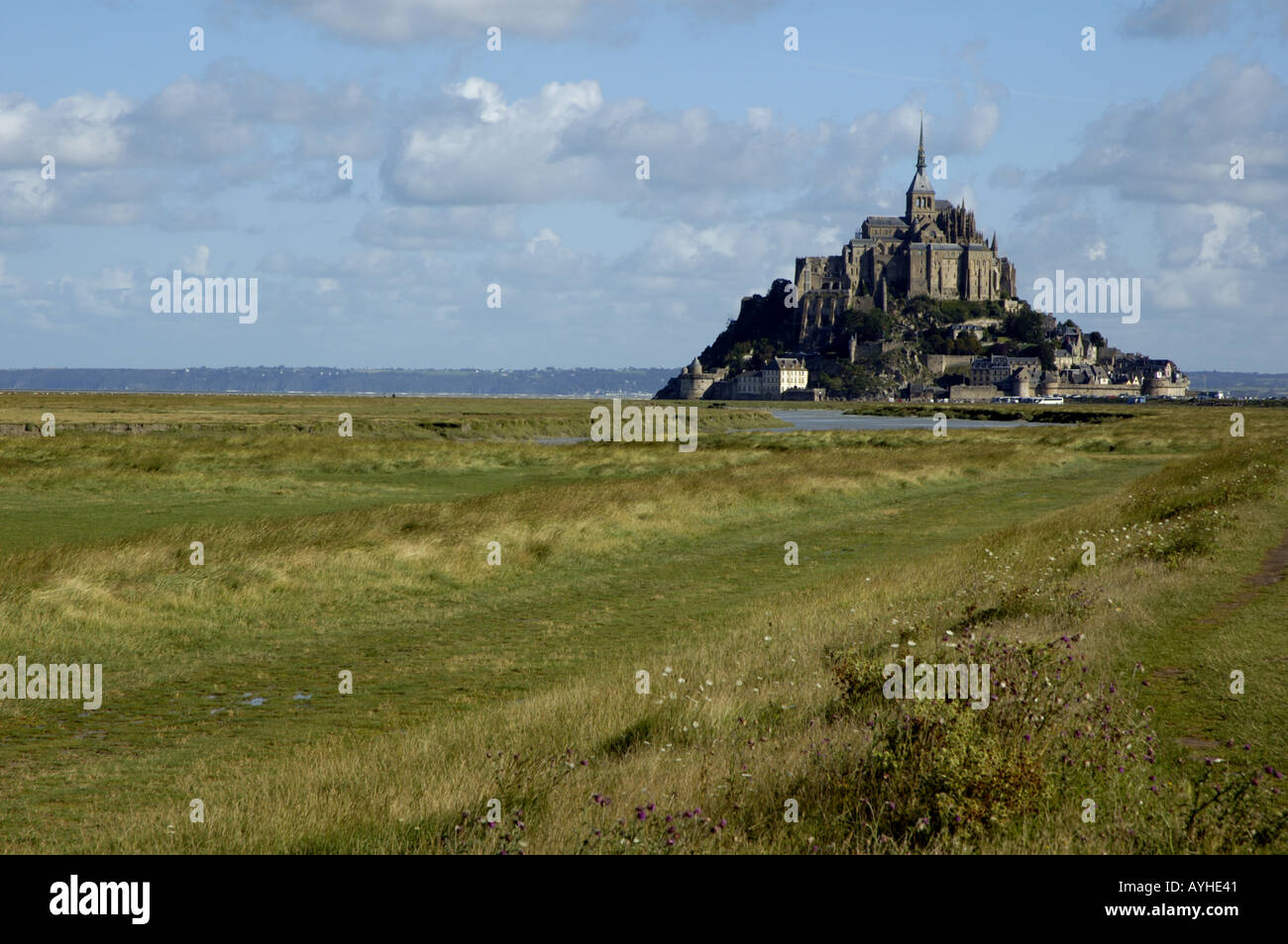 Mont Saint-Michel, a fortified medieval monastery on an island in ...