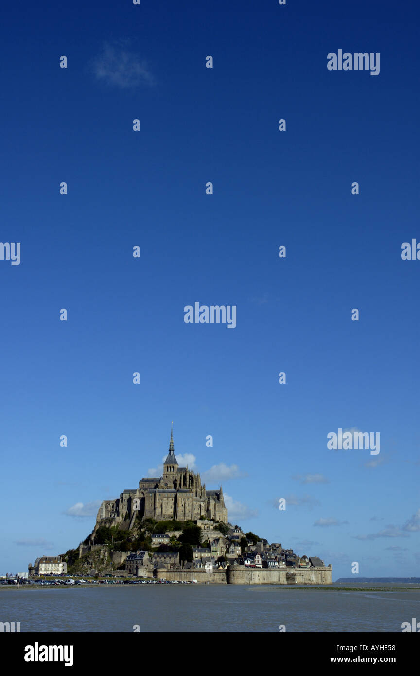 Mont Saint-Michel, a fortified medieval monastery on an island in ...