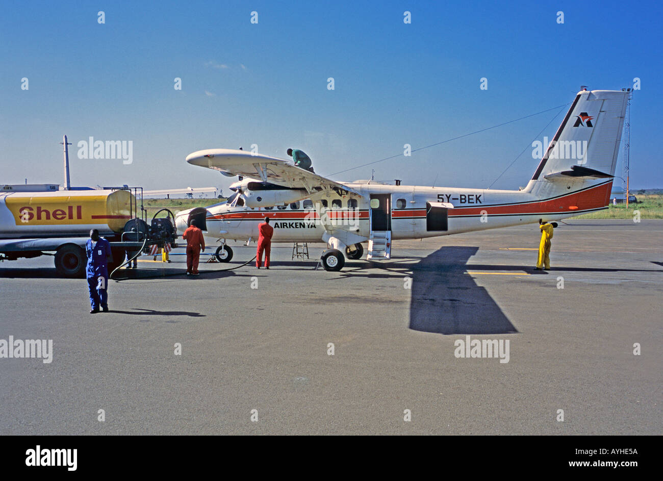 AFRICA KENYA NAIROBI Air Kenya propeller plane refueling with Shell ...