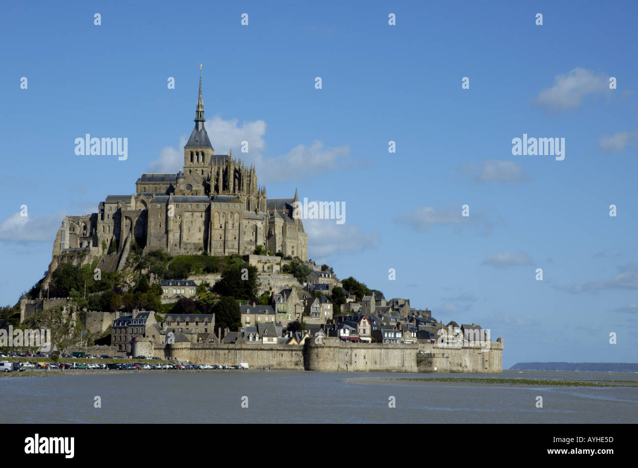 Mont Saint-Michel, a fortified medieval monastery on an island in ...