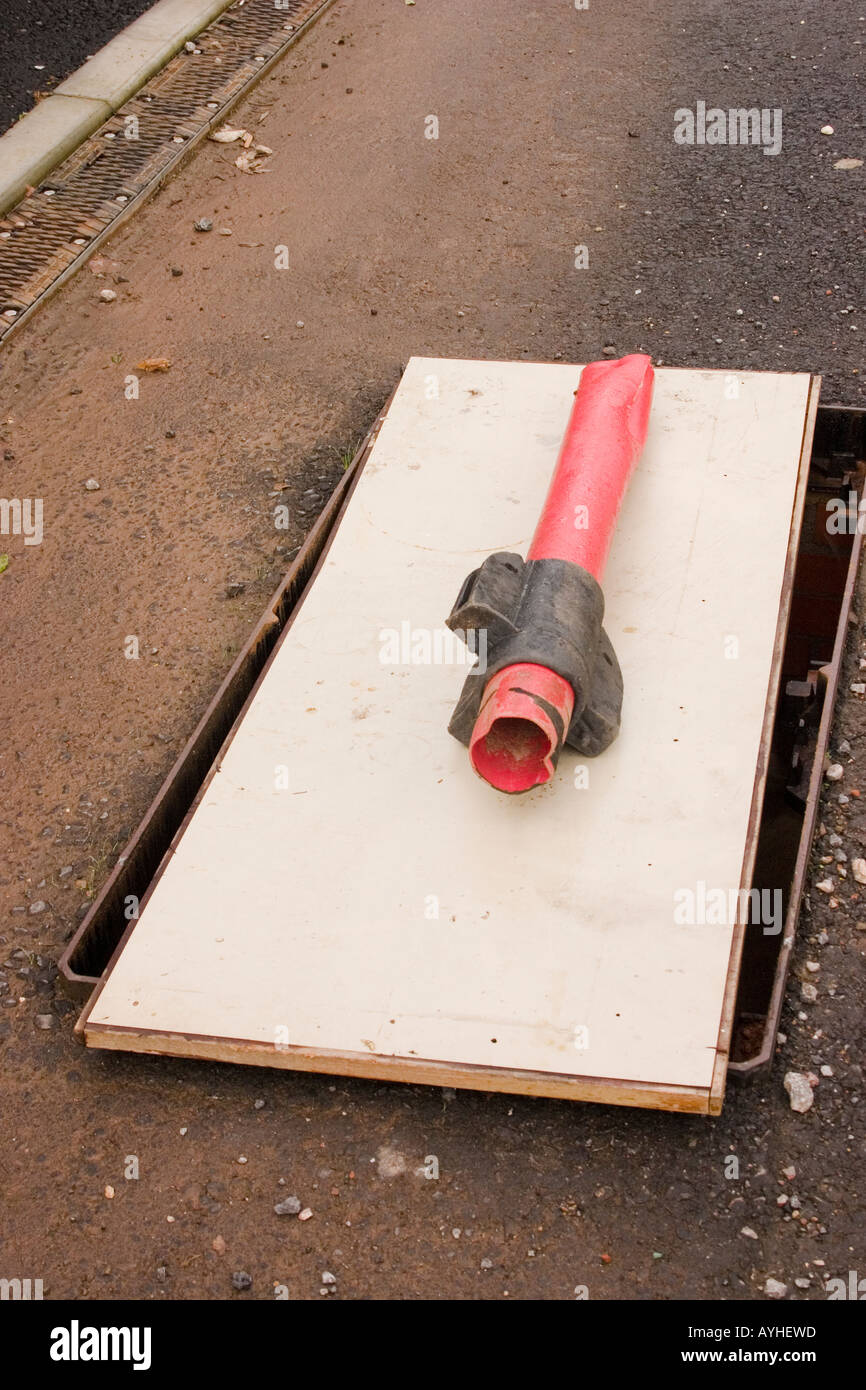 Temporary ineffectual manhole cover in a back lane Roath Cardiff UK ...