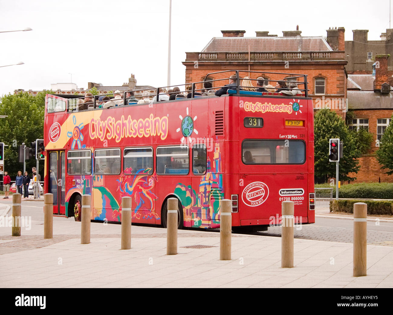 Open topped sight seeing bus Millenium Centre Cardiff Bay UK Stock ...