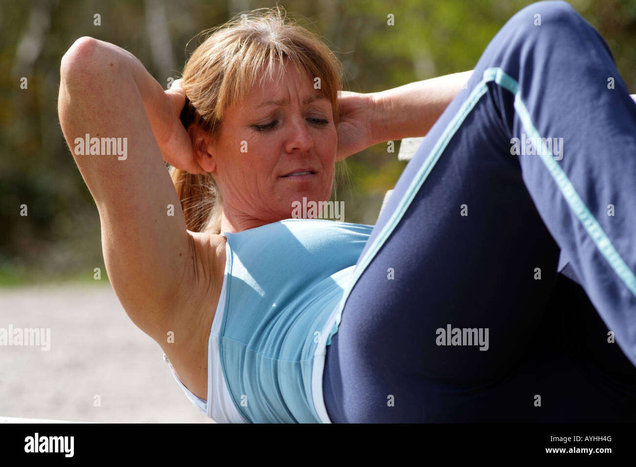 Woman laying back exercise hi-res stock photography and images - Alamy
