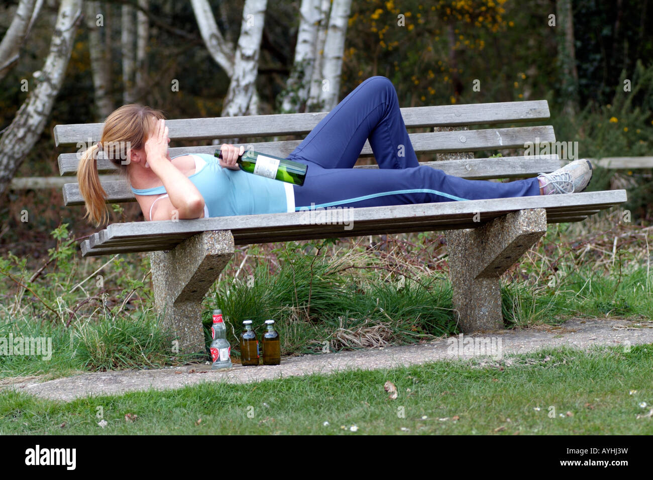 Woman drunk park bench hi-res stock photography and images - Alamy
