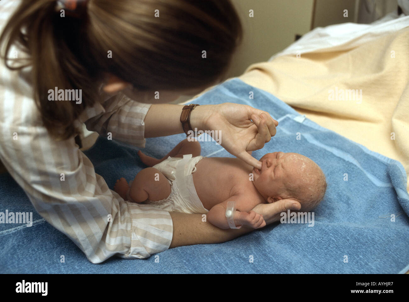 paediatric examining newborn baby in hospital ward Stock Photo - Alamy