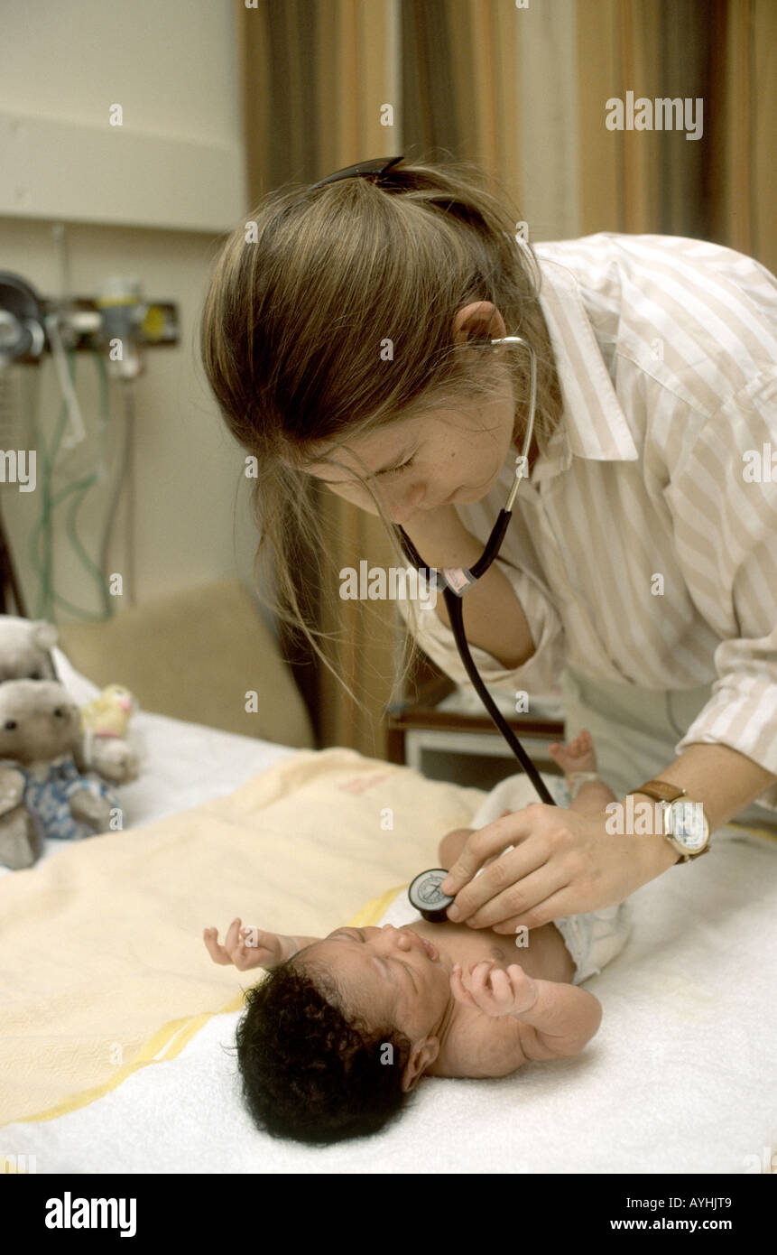 paediatric examining newborn baby in hospital ward Stock Photo - Alamy