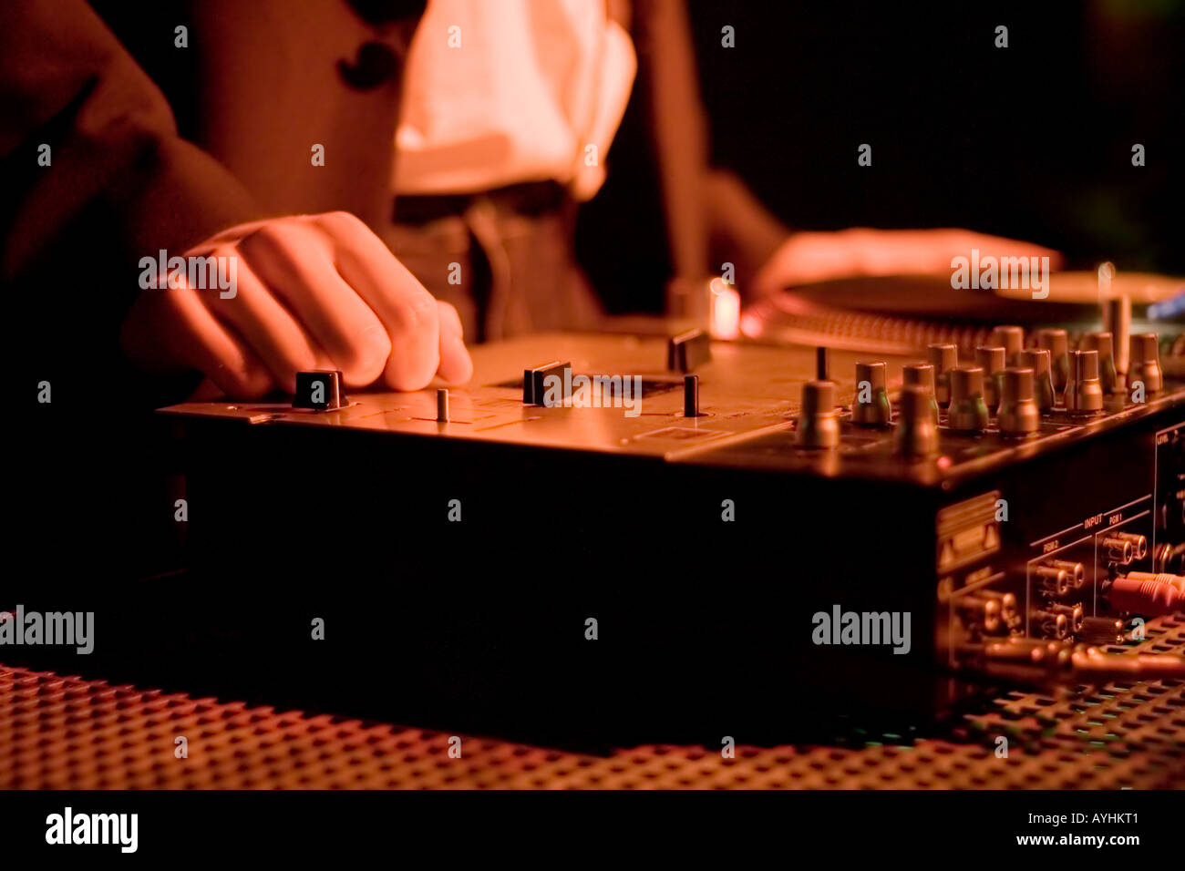 DJ at the Turntables Stock Photo - Alamy