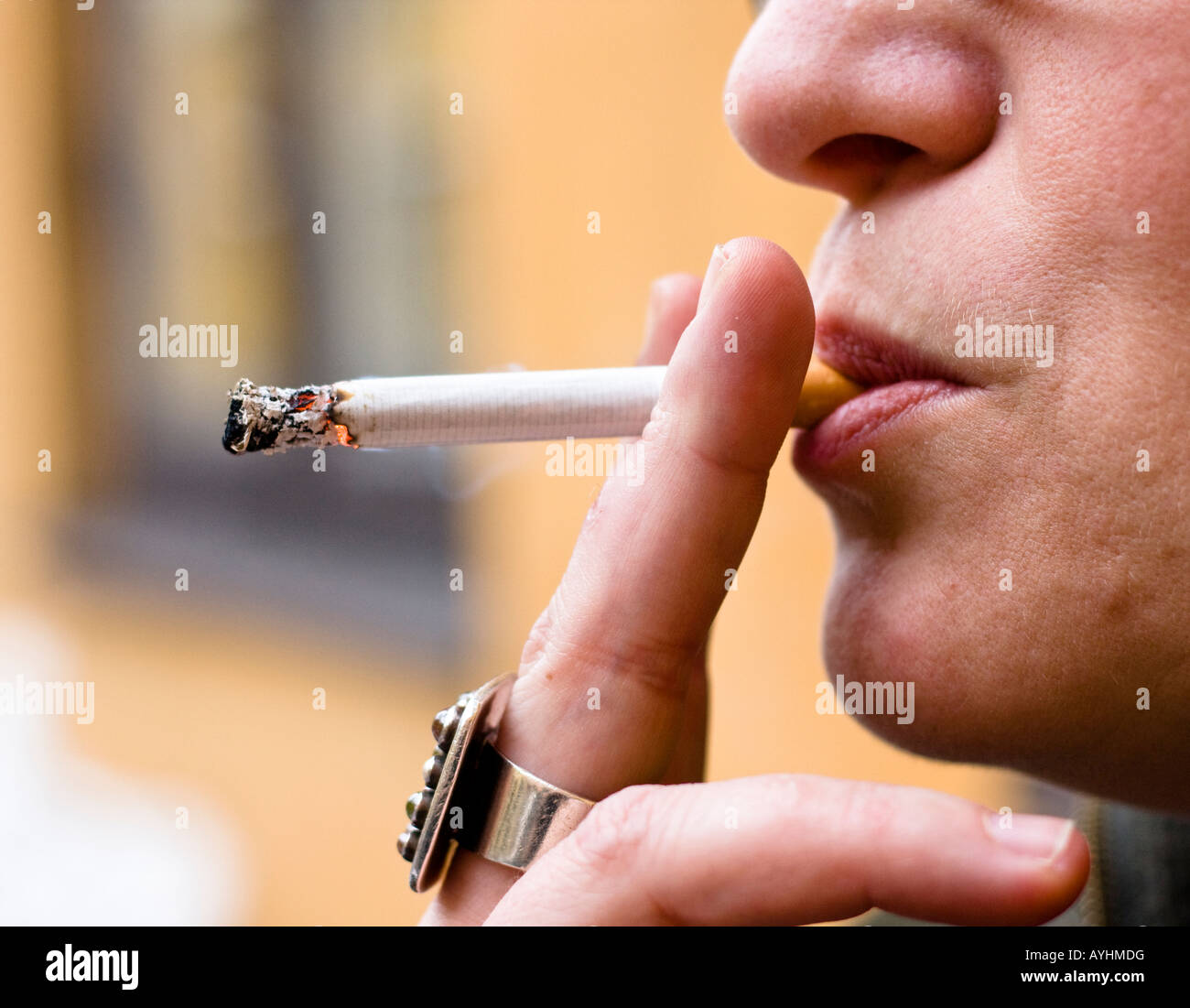 Woman smoking a cigarette hi-res stock photography and images - Alamy
