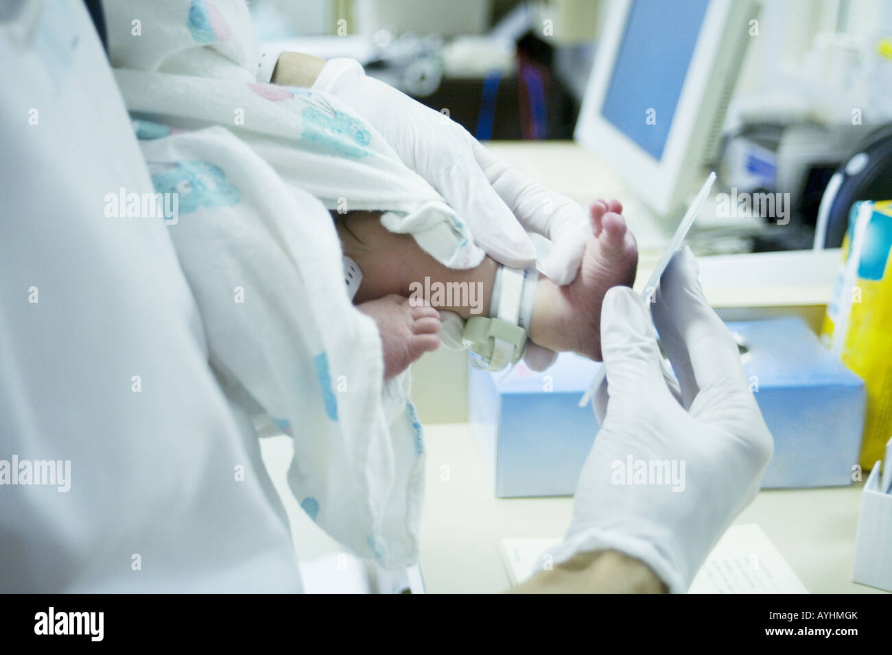 Nurse taking newborn footprints in the hospital after childbirth Stock ...