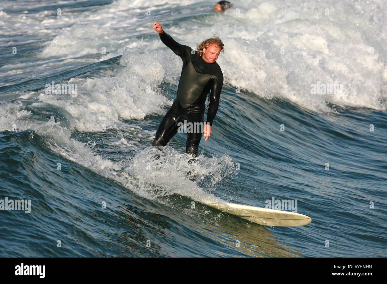 Skilled longboard surfing hi-res stock photography and images - Alamy