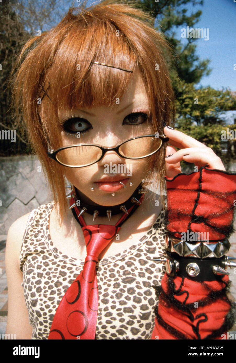 Teenage dressed for cos-play coz-play with unusual contact lenses on ...