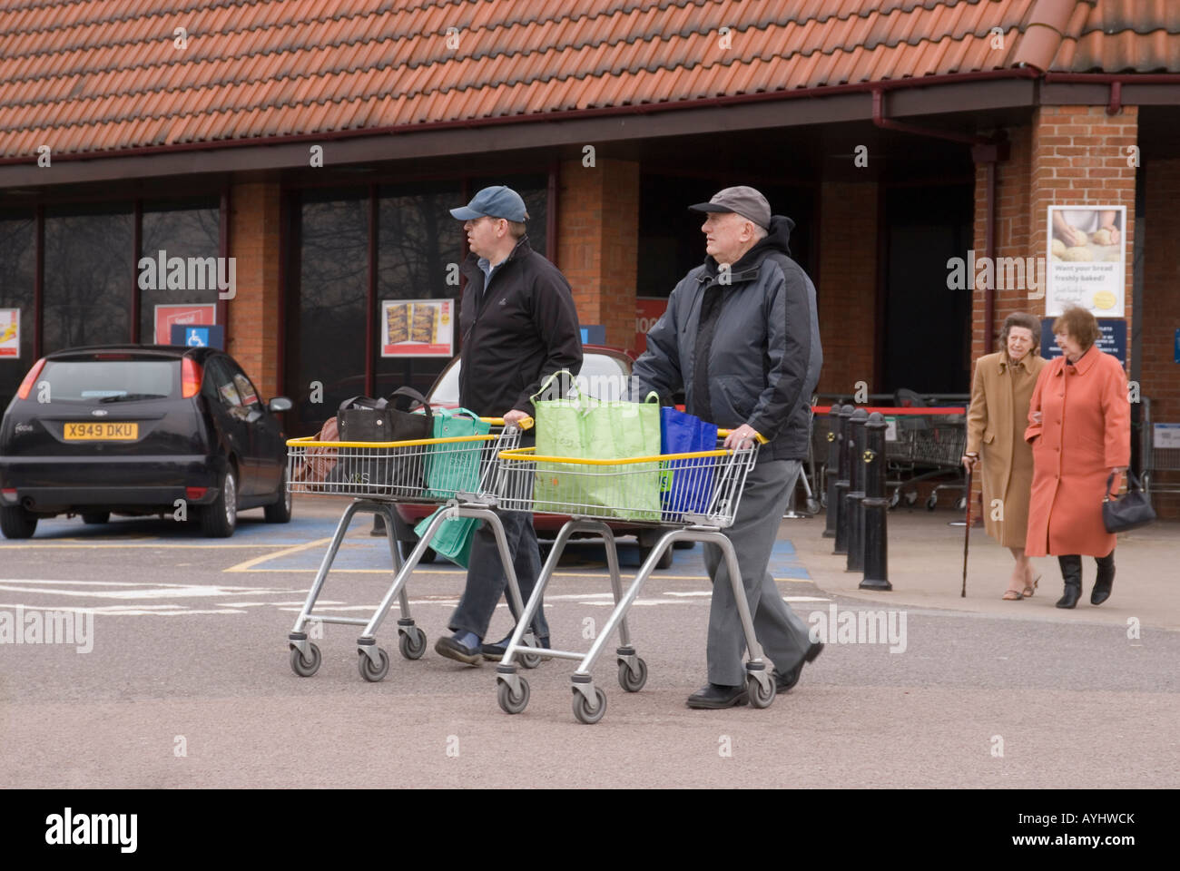 Men With Trolleys At Morrisons Store At Beccles,Suffolk,Uk Stock Photo ...