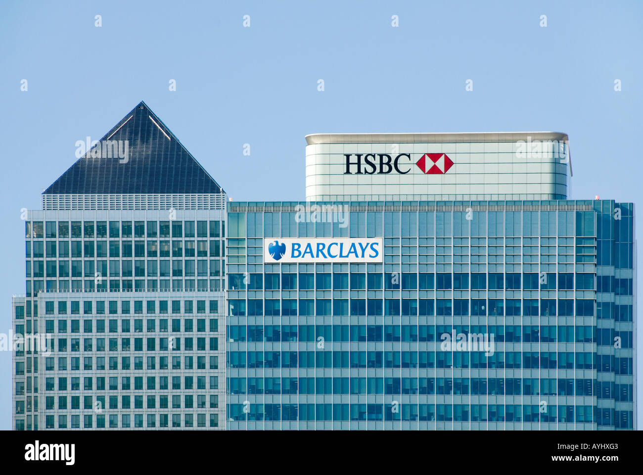 Close up roof level facards One Canada Square office building Barclays & HSBC Bank landmark ...