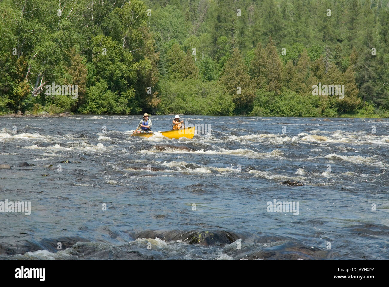 paddlers shooting rapids Stock Photo - Alamy