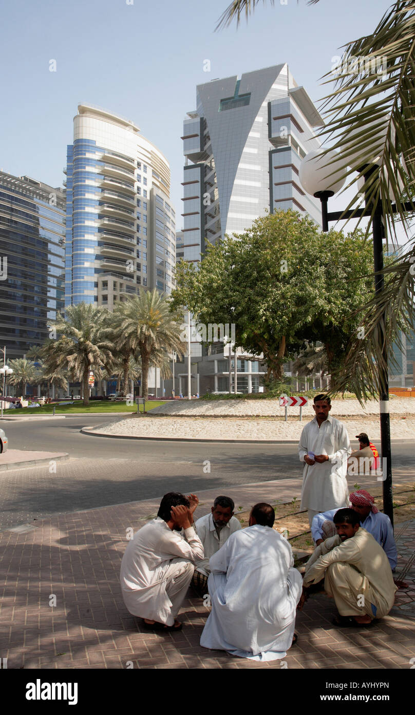 United Arab Emirates Dubai Deira office buildings Pakistani men Stock ...
