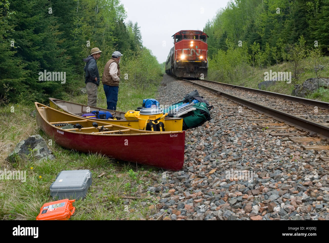waiting for train with canoe Stock Photo - Alamy