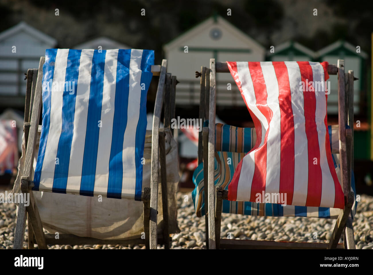 Brightly coloured deck chairs blowing in the wind Stock Photo - Alamy